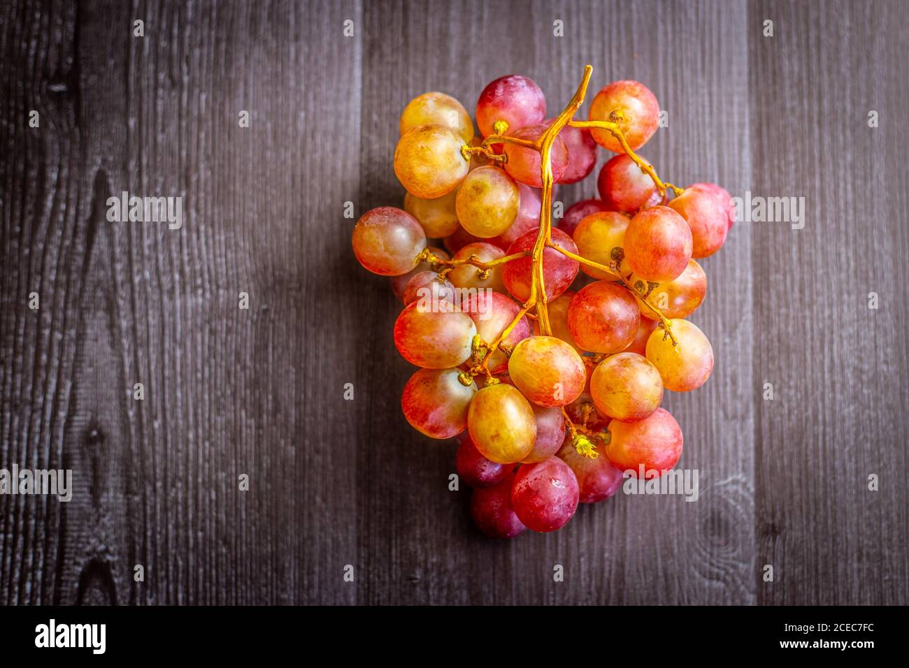 Grapes on table Stock Photo - Alamy