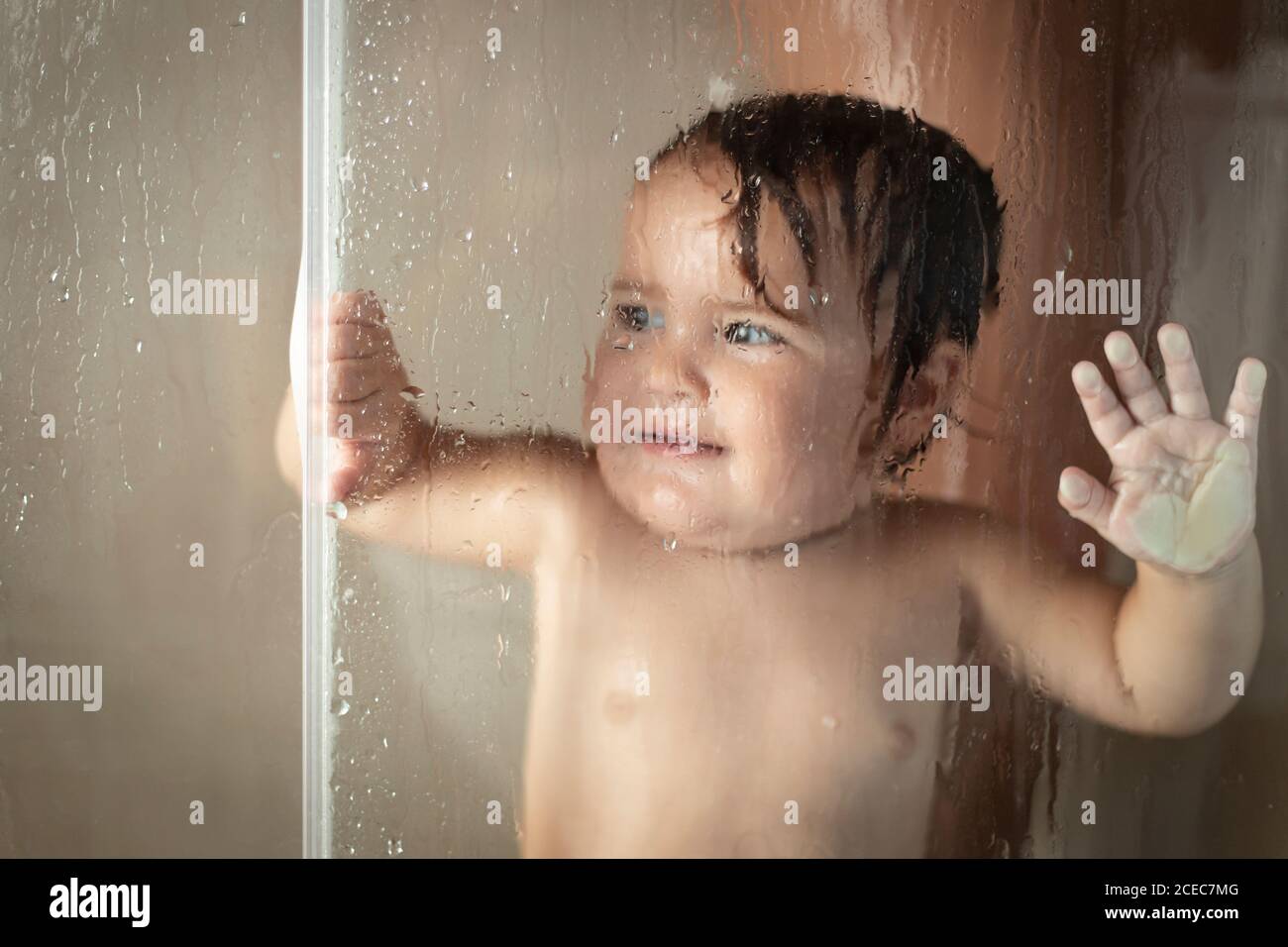 Mother taking shower baby hi-res stock photography and images - Alamy