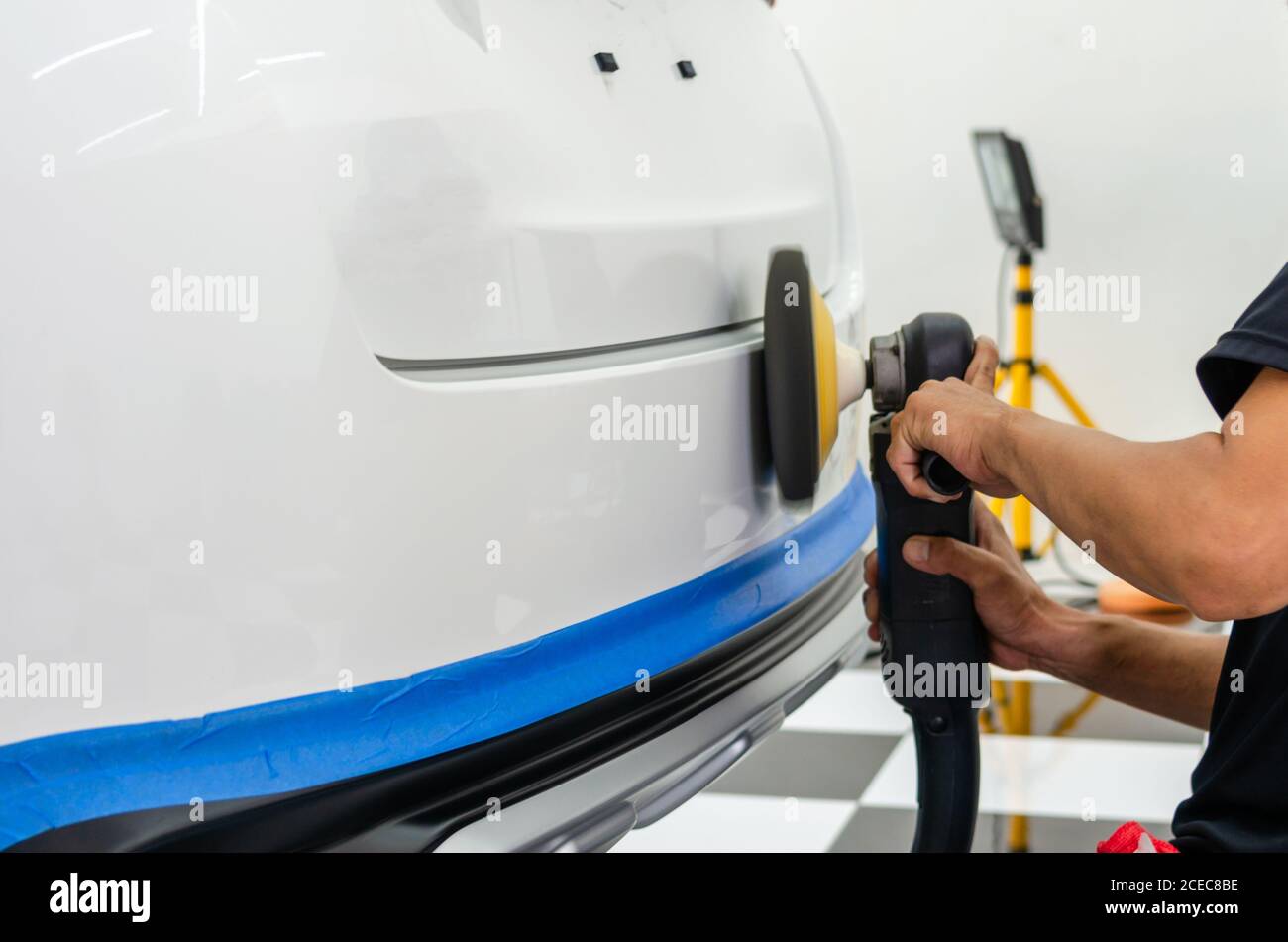 Man hands holding the work tool polish the car.Buffing and polishing ...
