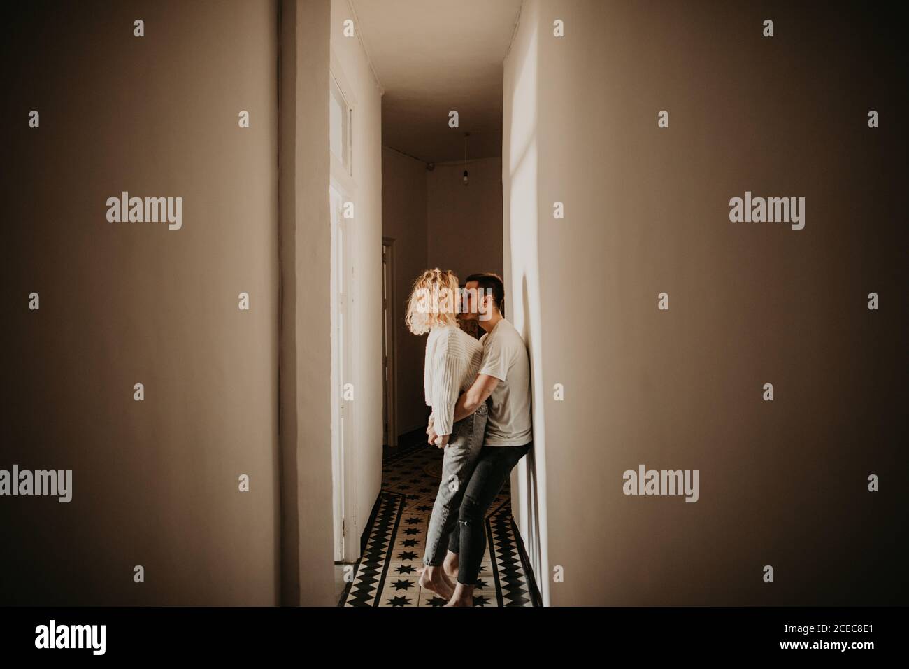 Couple passion home kissing hi-res stock photography and images - Alamy