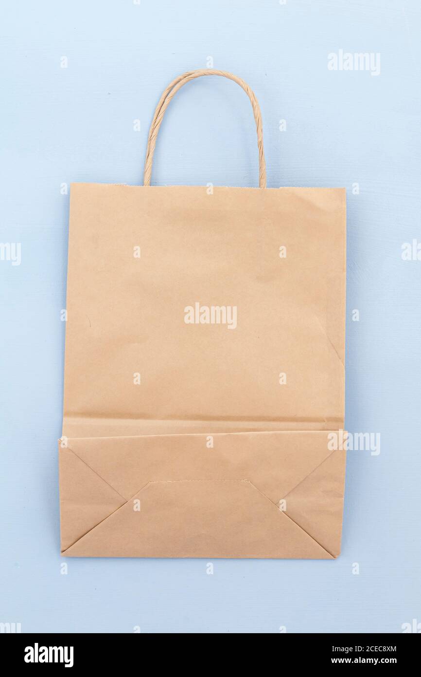 Craft paper bag, recycling and ecology concept Stock Photo - Alamy