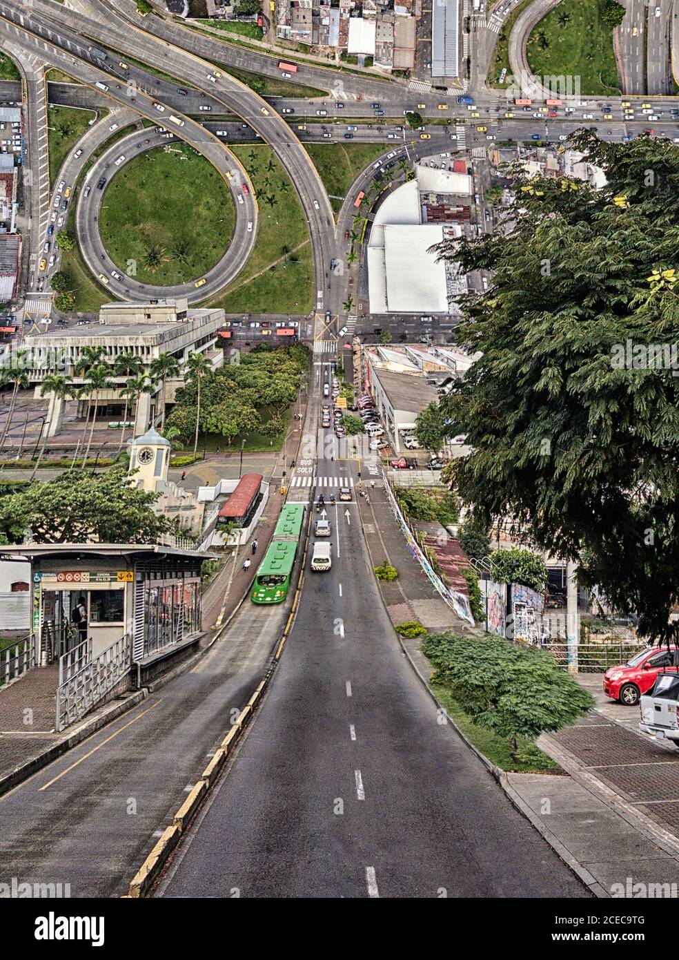 Perspective view of cars driving on road in the city driving upwards ...