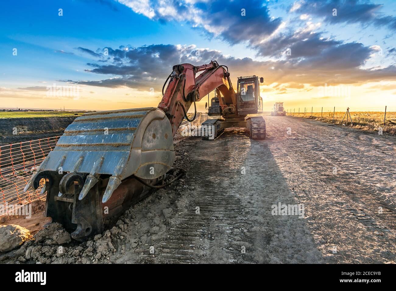 Modern excavator machine in remote area on site Stock Photo - Alamy