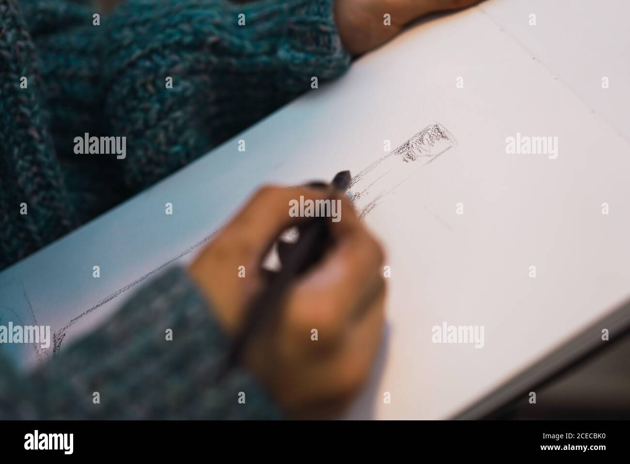 Woman creating drawing in studio Stock Photo - Alamy