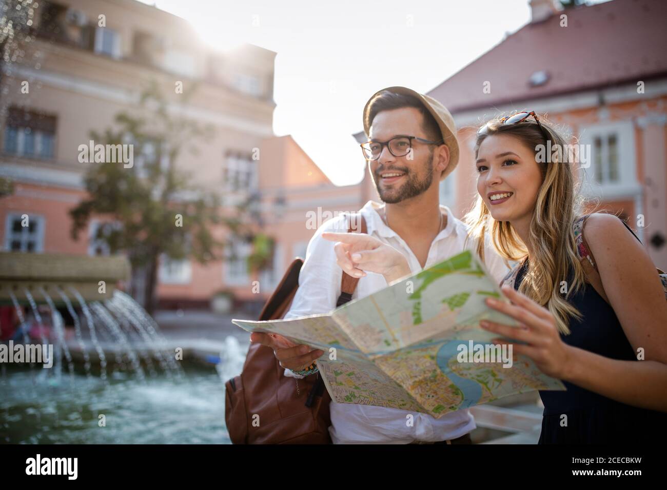 Happy tourist couple in love having fun, travel, smiling on vacation ...