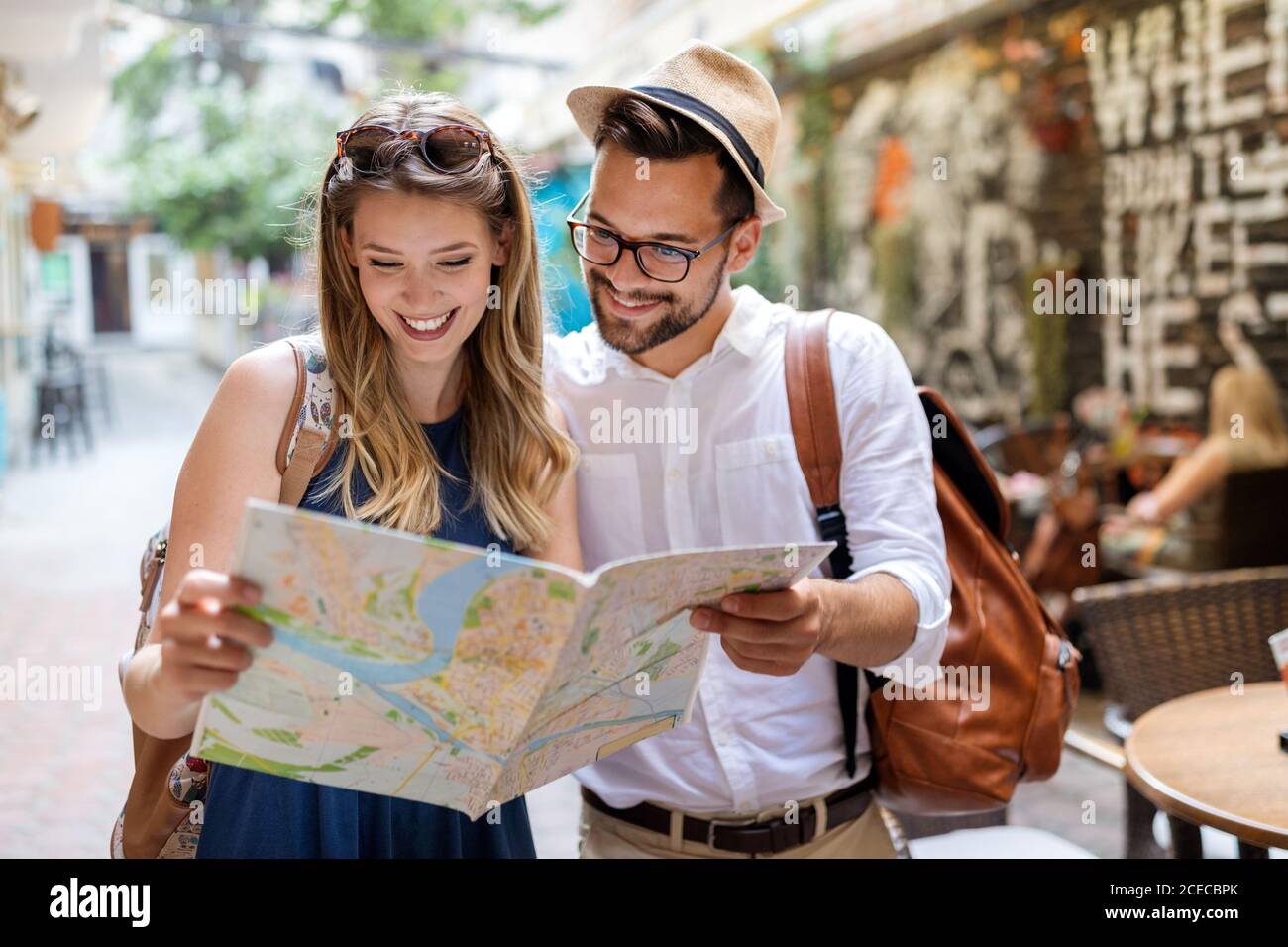 Happy tourist couple in love having fun, travel, smiling on vacation ...