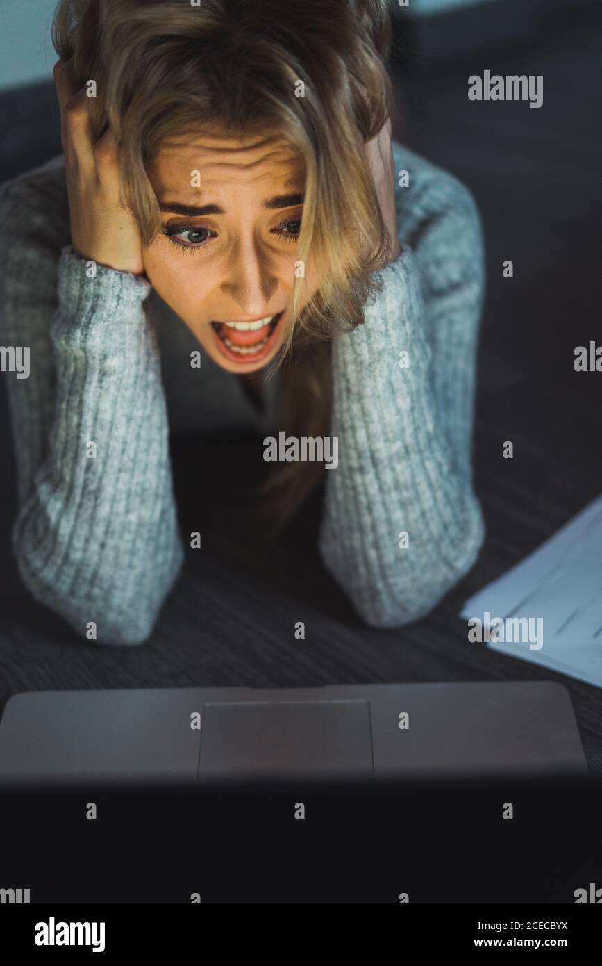 Shocked scared Woman at laptop Stock Photo - Alamy
