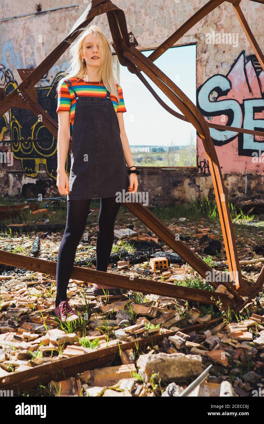 Sensual model in grunge backyard Stock Photo - Alamy