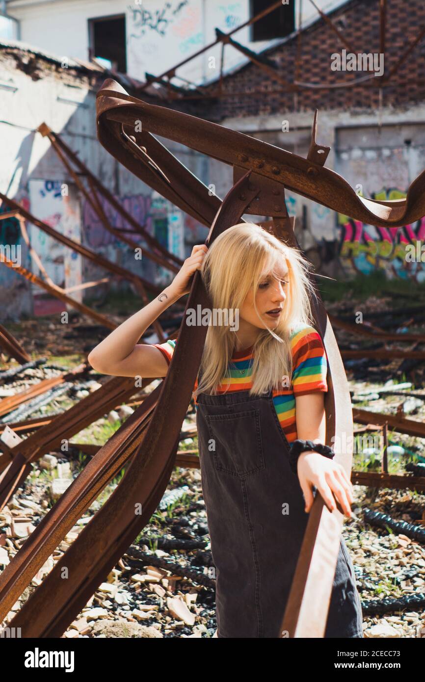 Sensual model in grunge backyard Stock Photo - Alamy