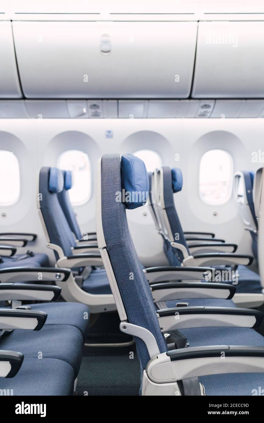 Aisle in modern plane cabin Stock Photo - Alamy