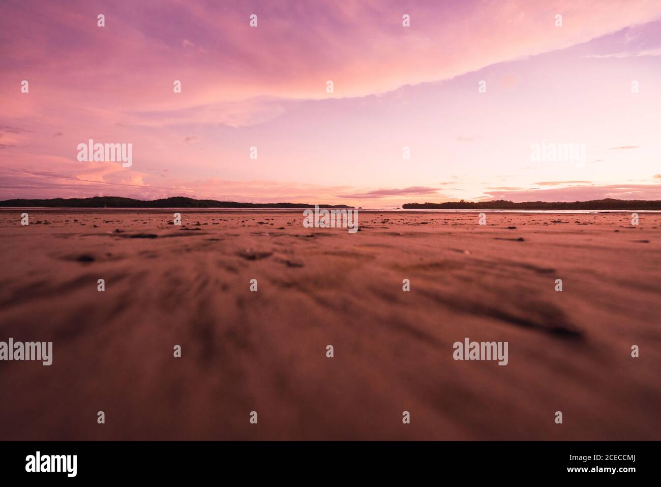 Empty remote sandy beach in pink sunset light, Bocas del Toro Stock ...
