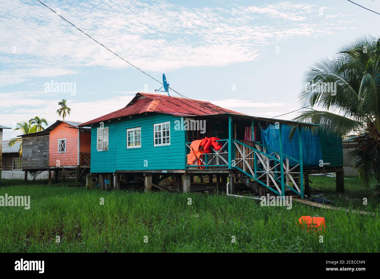 Exterior of colorful small houses in tropical countryside of Bocas del ...