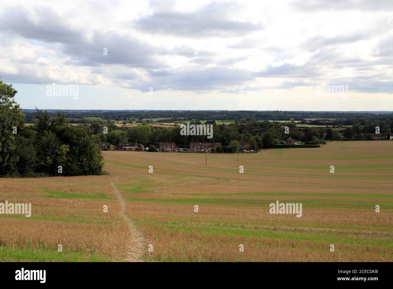 Footpath and view across fields to Westwell village from Dun Street ...