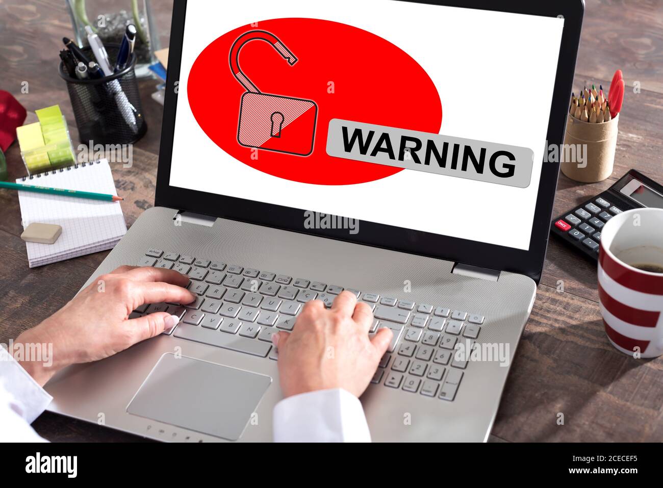 Warning concept shown on a laptop screen Stock Photo - Alamy