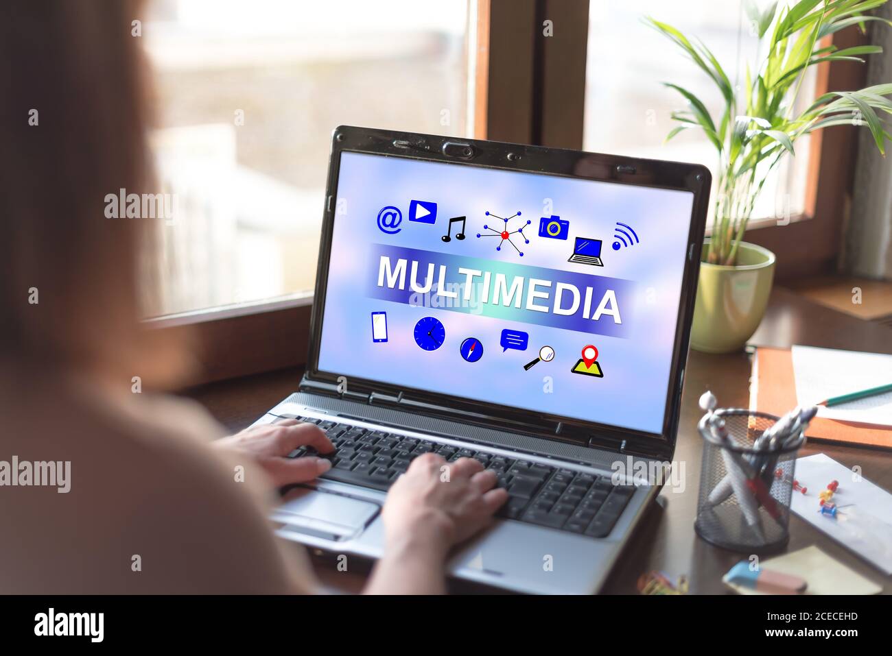 Laptop screen displaying a multimedia concept Stock Photo - Alamy