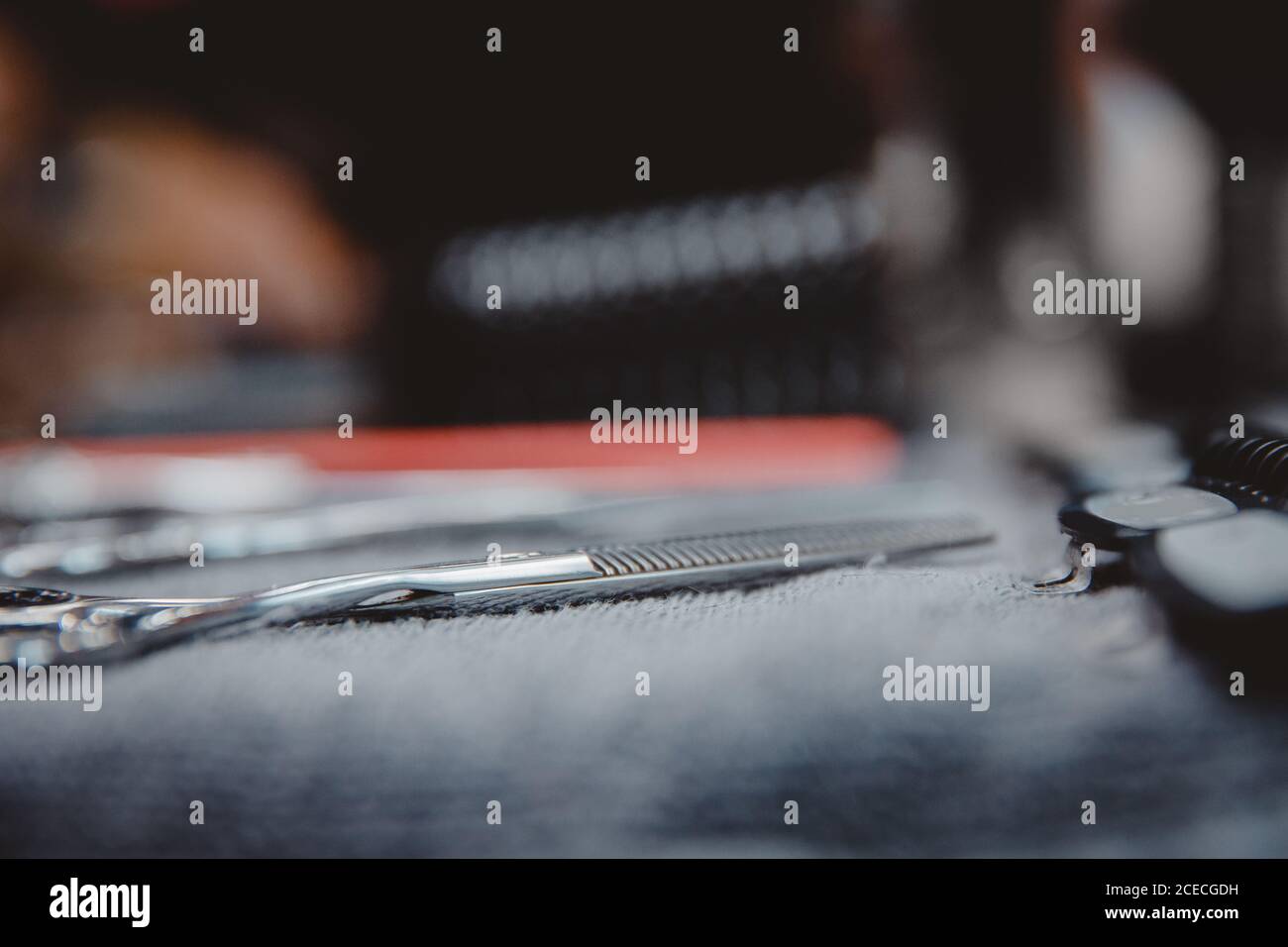 Hairdresser tools: combs, razors, scissors hair clipper Stock Photo - Alamy
