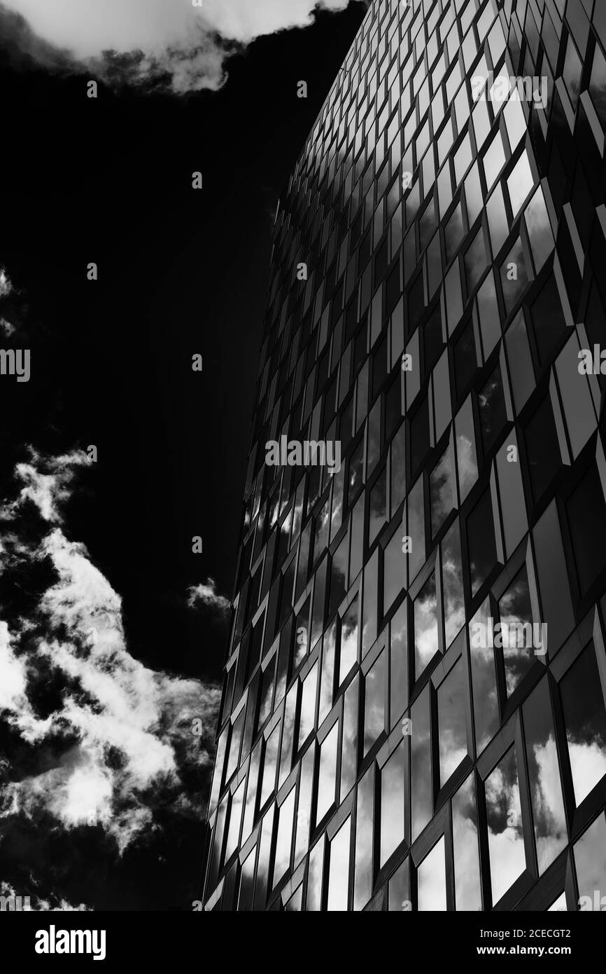 Dark image of skyscraper in black and white Stock Photo - Alamy