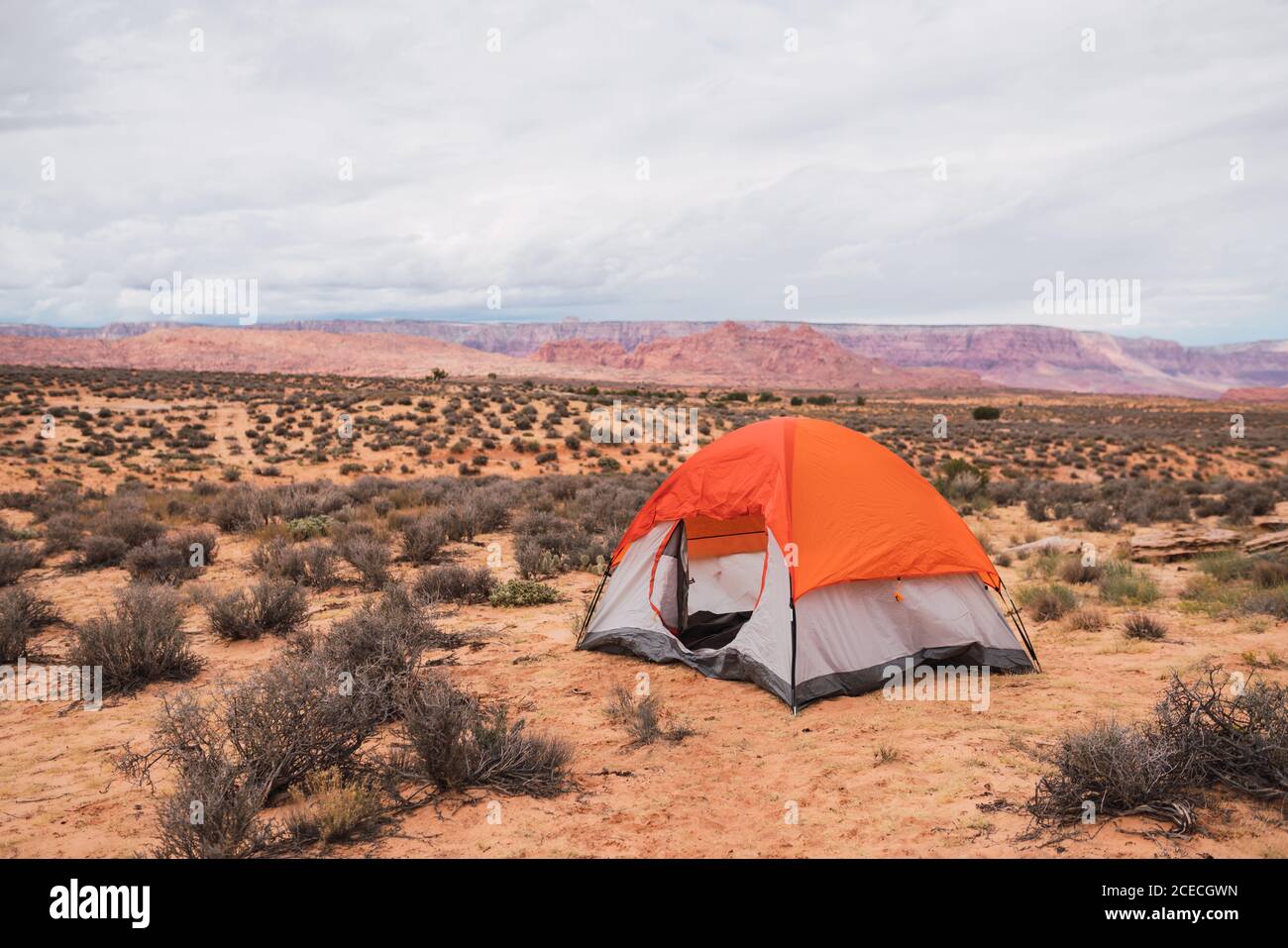 Empty tourist tent standing in middle of magnificent desert on cloudy ...