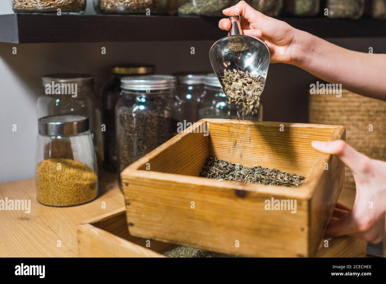 girl throwing spices in box Stock Photo - Alamy