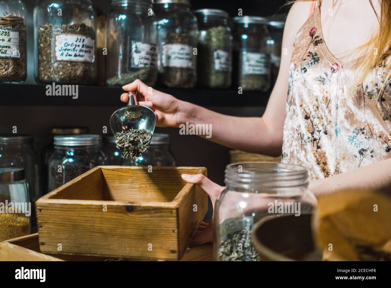 girl throwing spices in box Stock Photo - Alamy