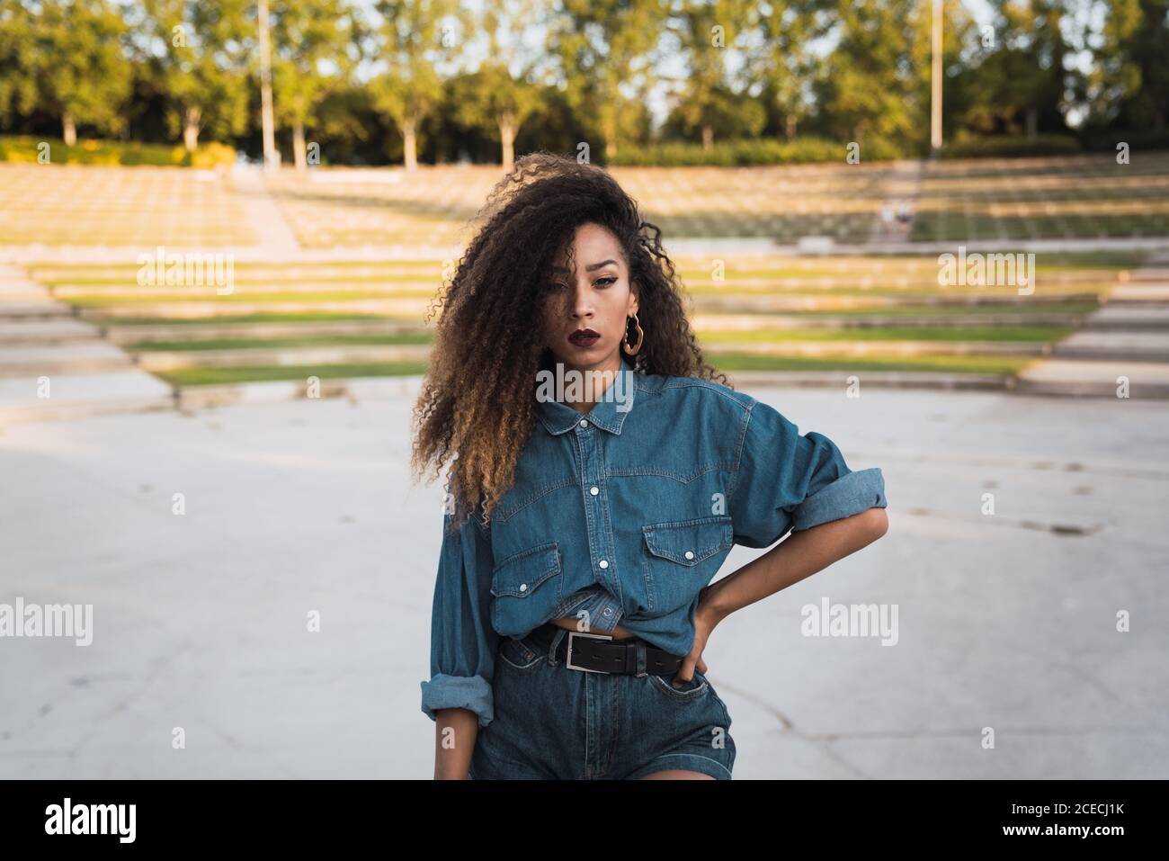 American woman standing hi-res stock photography and images - Alamy