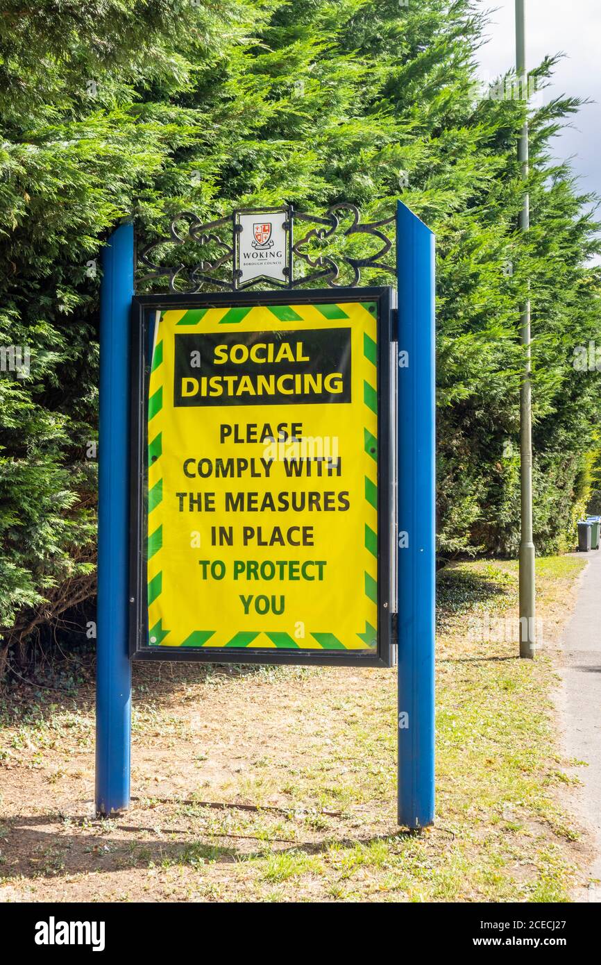 The new normal: large roadside sign, Woking, Surrey, reminding people ...