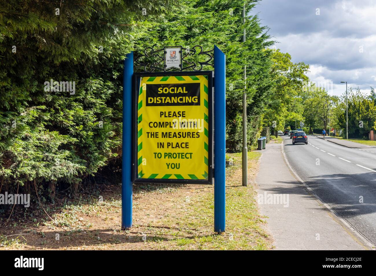 The new normal: large roadside sign, Woking, Surrey, reminding people ...