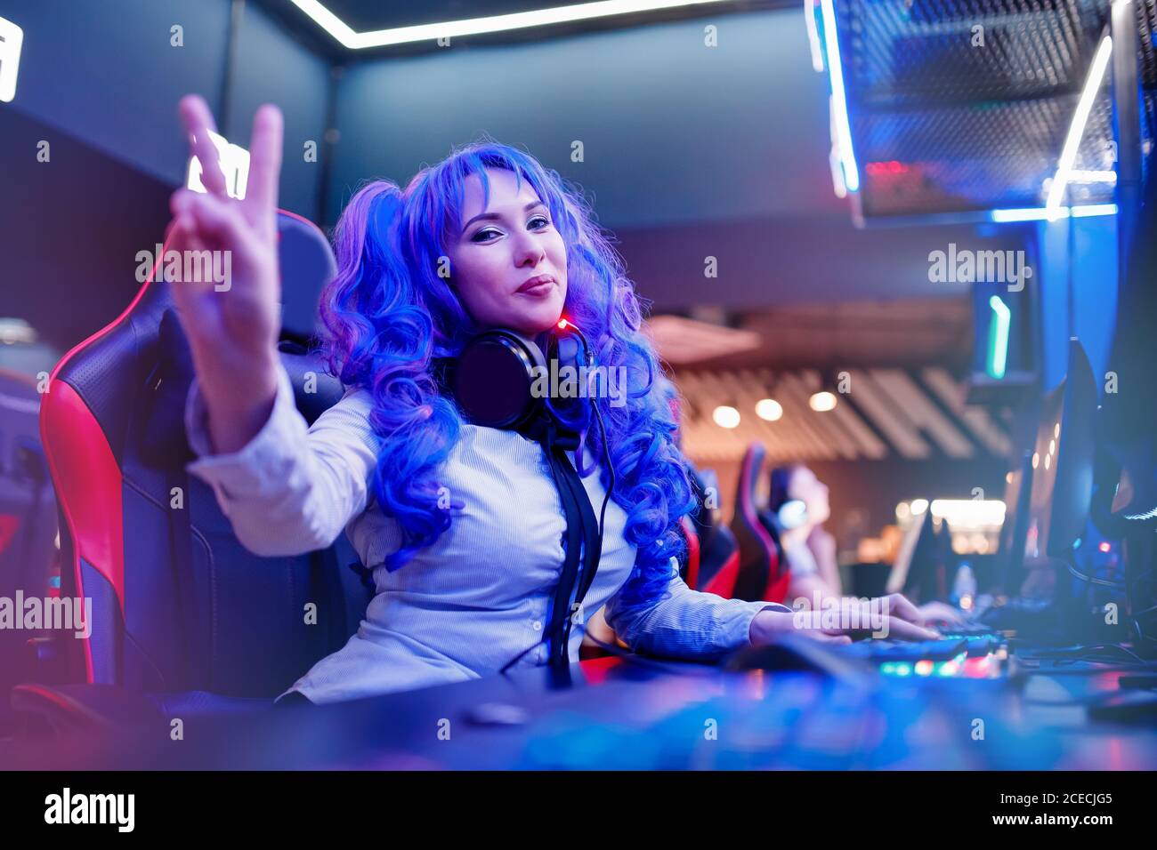 Streamer anime cosplay woman professional gamer playing online video ...