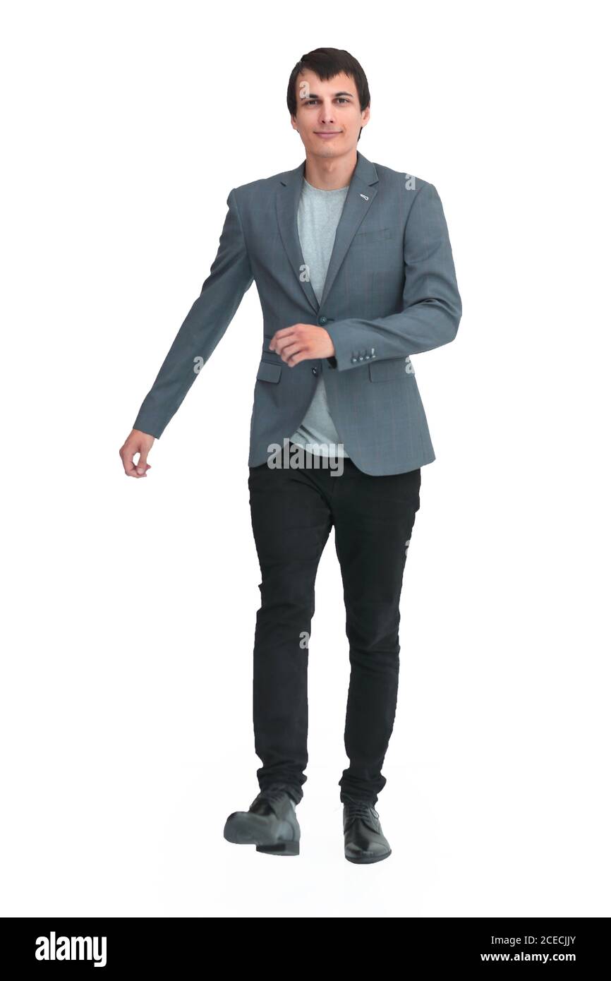 rear view. happy young man striding forward Stock Photo - Alamy