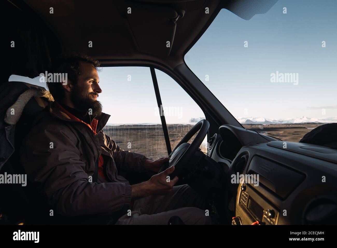 man driving road in nature Stock Photo - Alamy