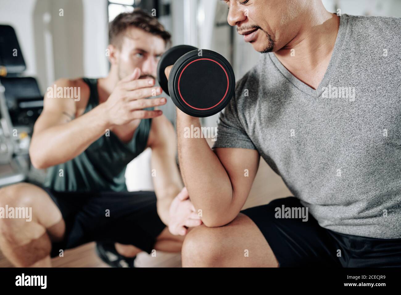 Personal trainer client sitting hi-res stock photography and images - Alamy