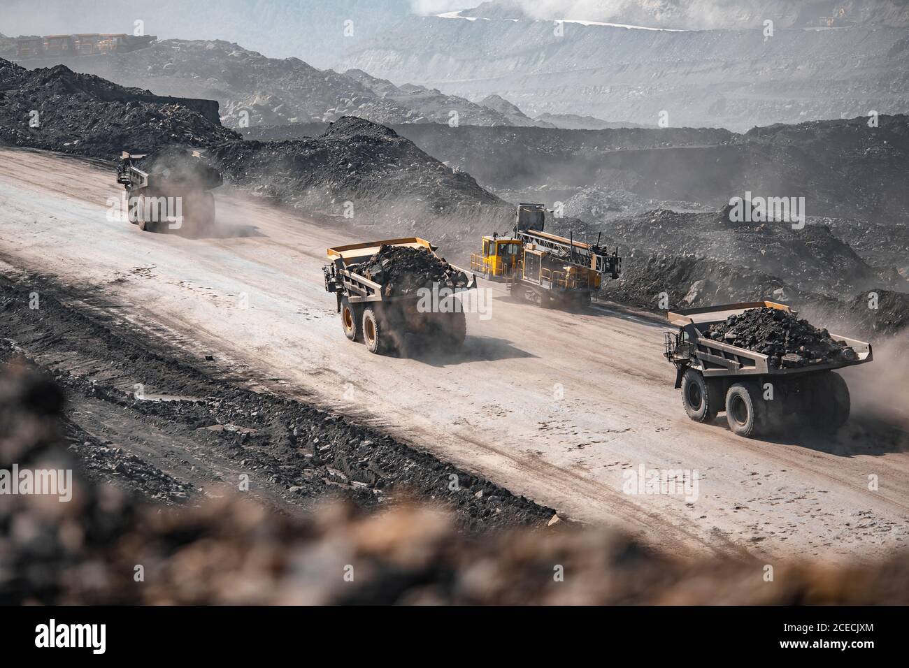 Big yellow mining truck coal transportation. Open pit mine industry ...