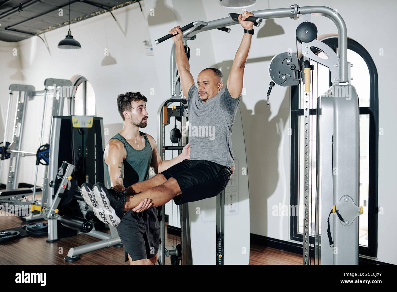 Hanging weights hi-res stock photography and images - Alamy