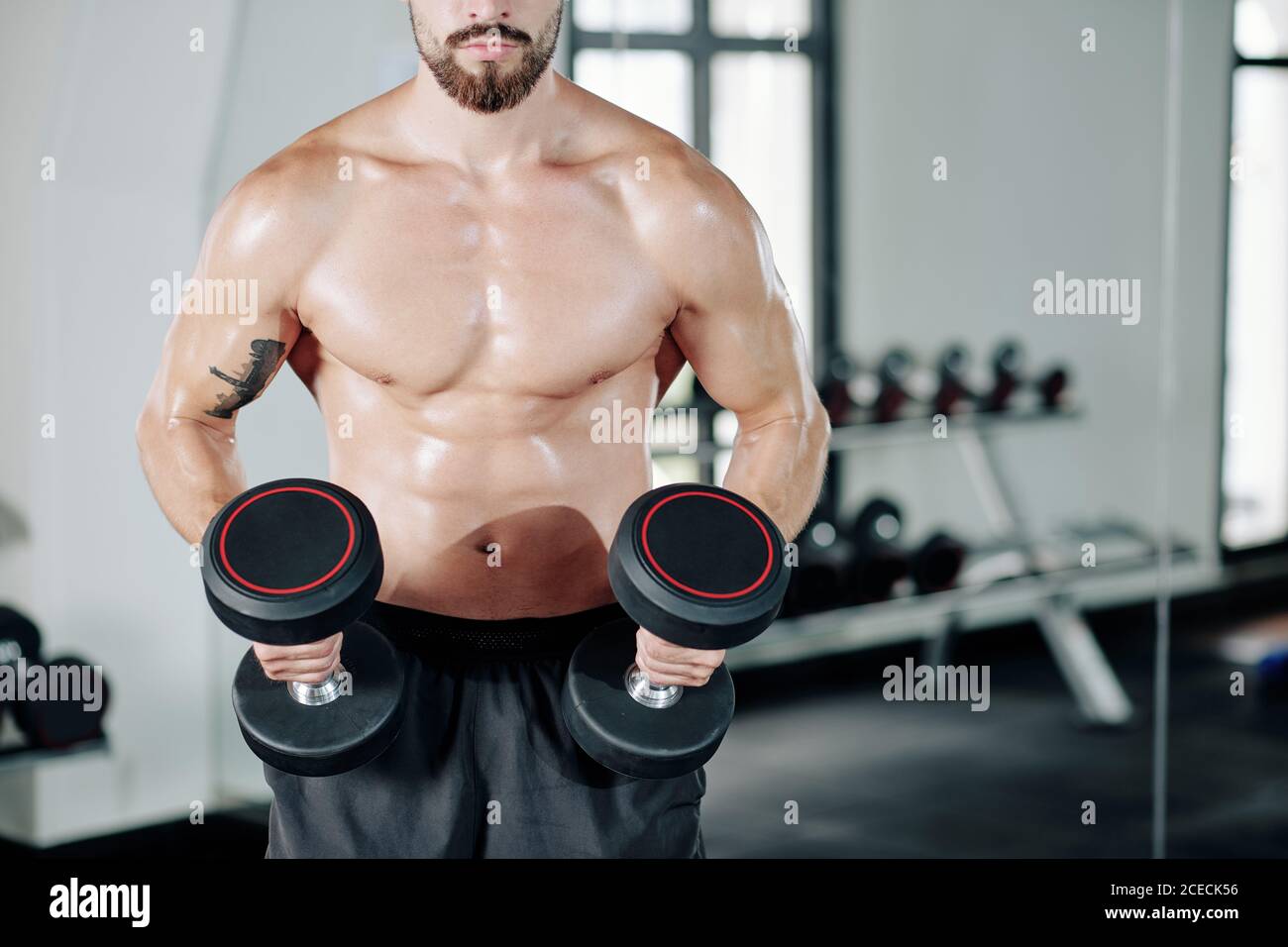 Exercising muscular man Stock Photo - Alamy