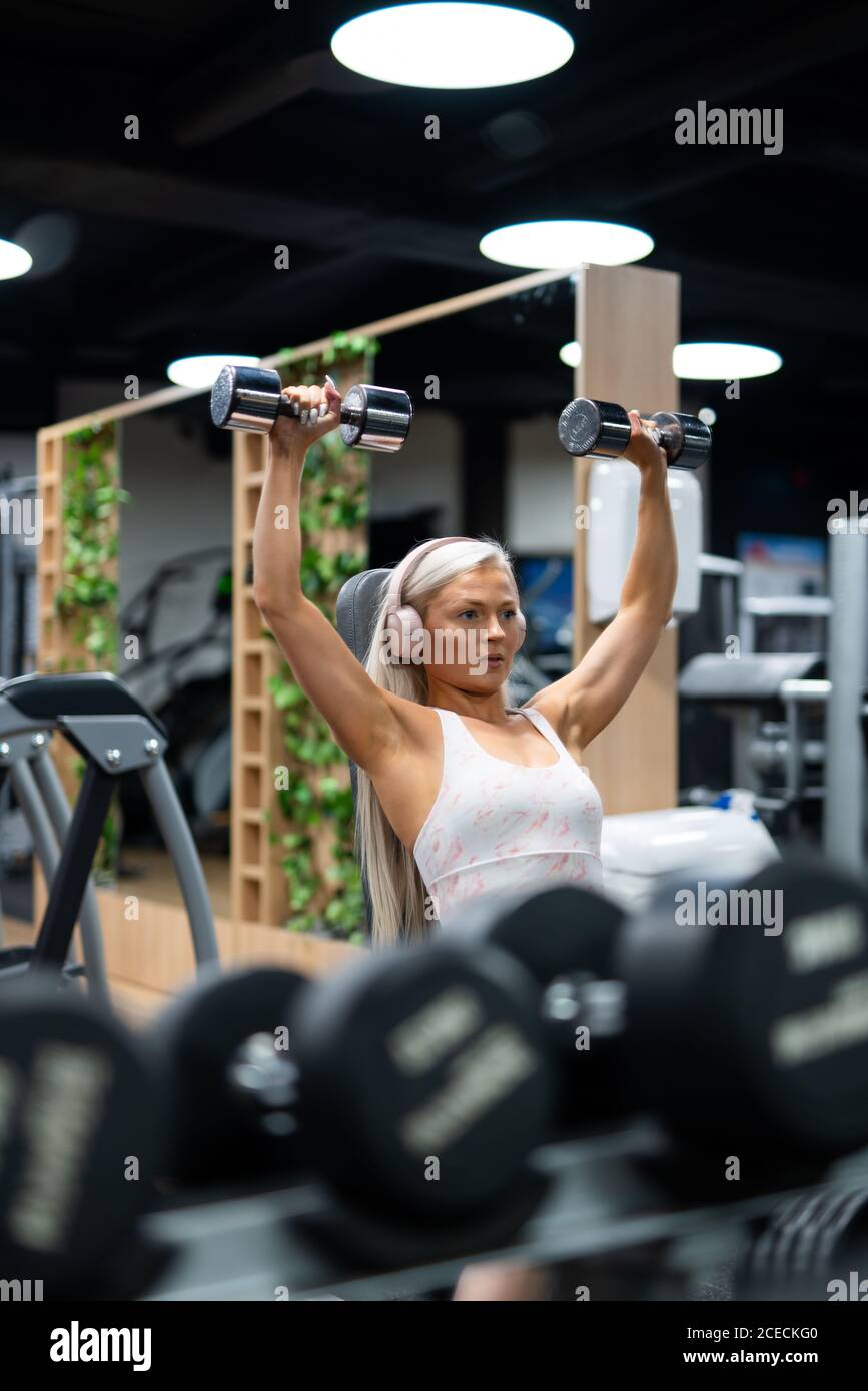 Strong woman working out equipment hi-res stock photography and images ...