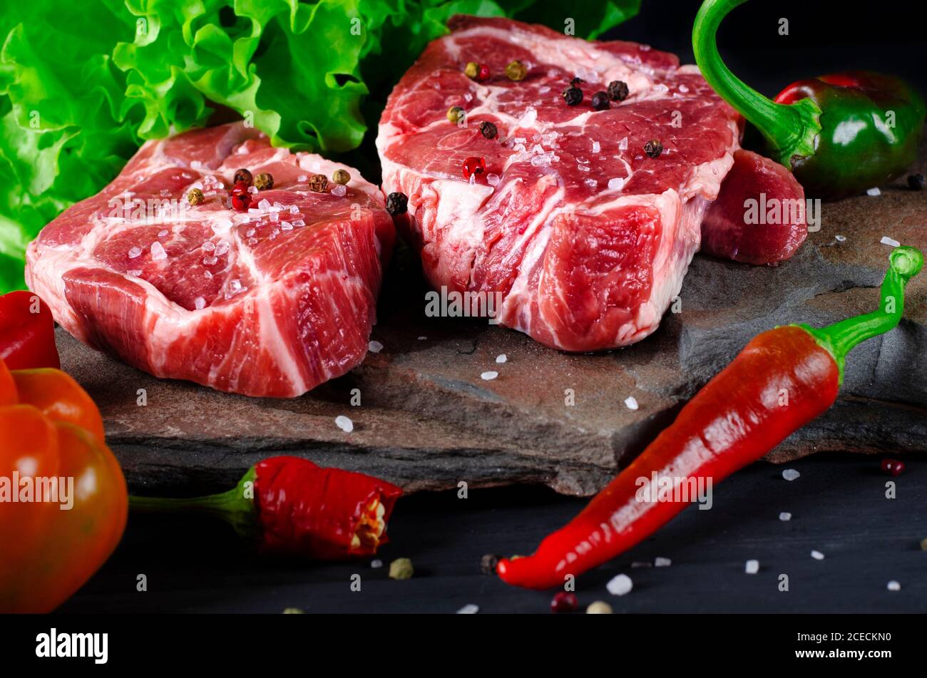 Food set for a picnic. Beef steaks ribeye ready to cook at barbecue ...
