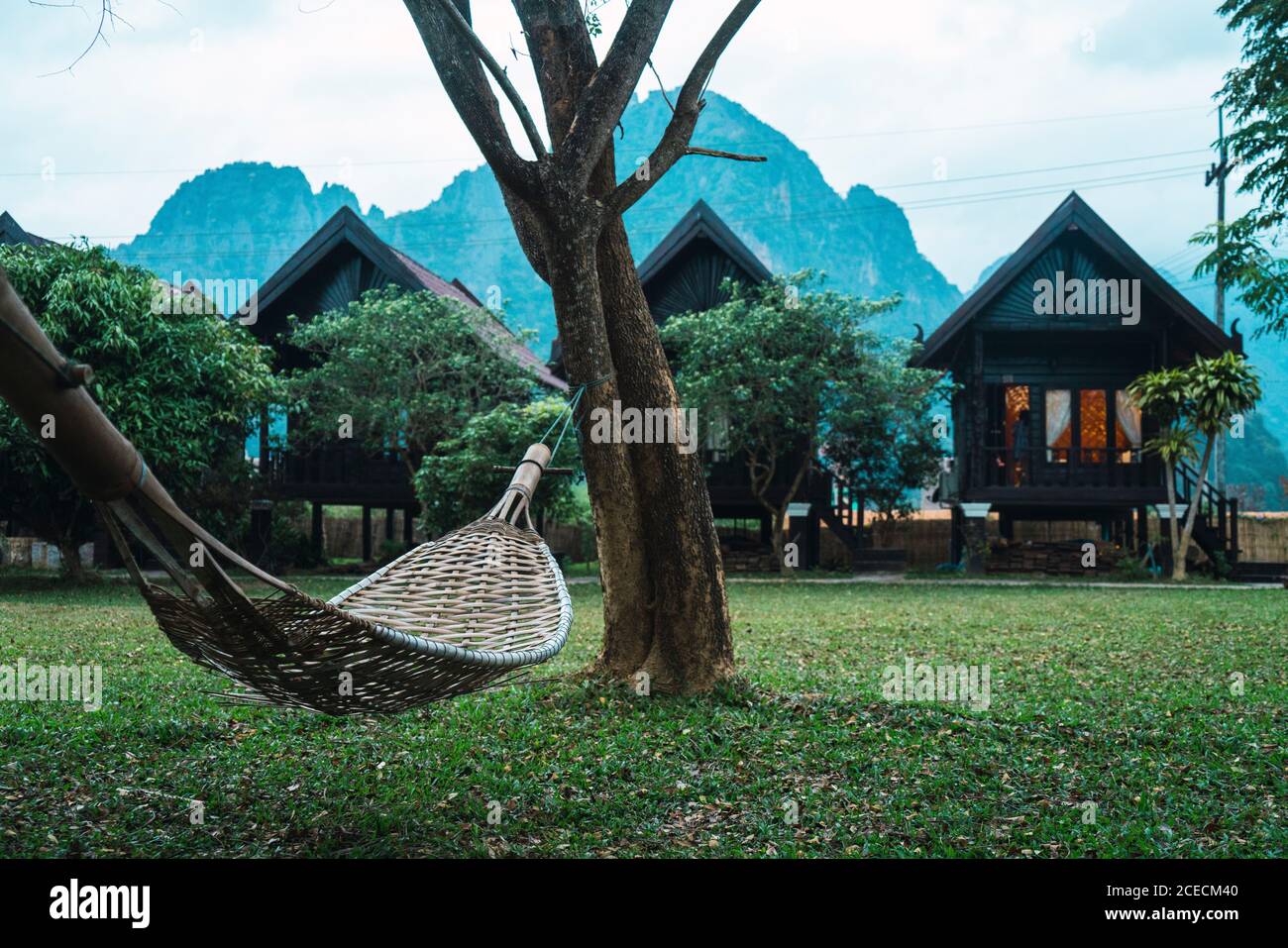 Straw hammock on meadow Stock Photo - Alamy