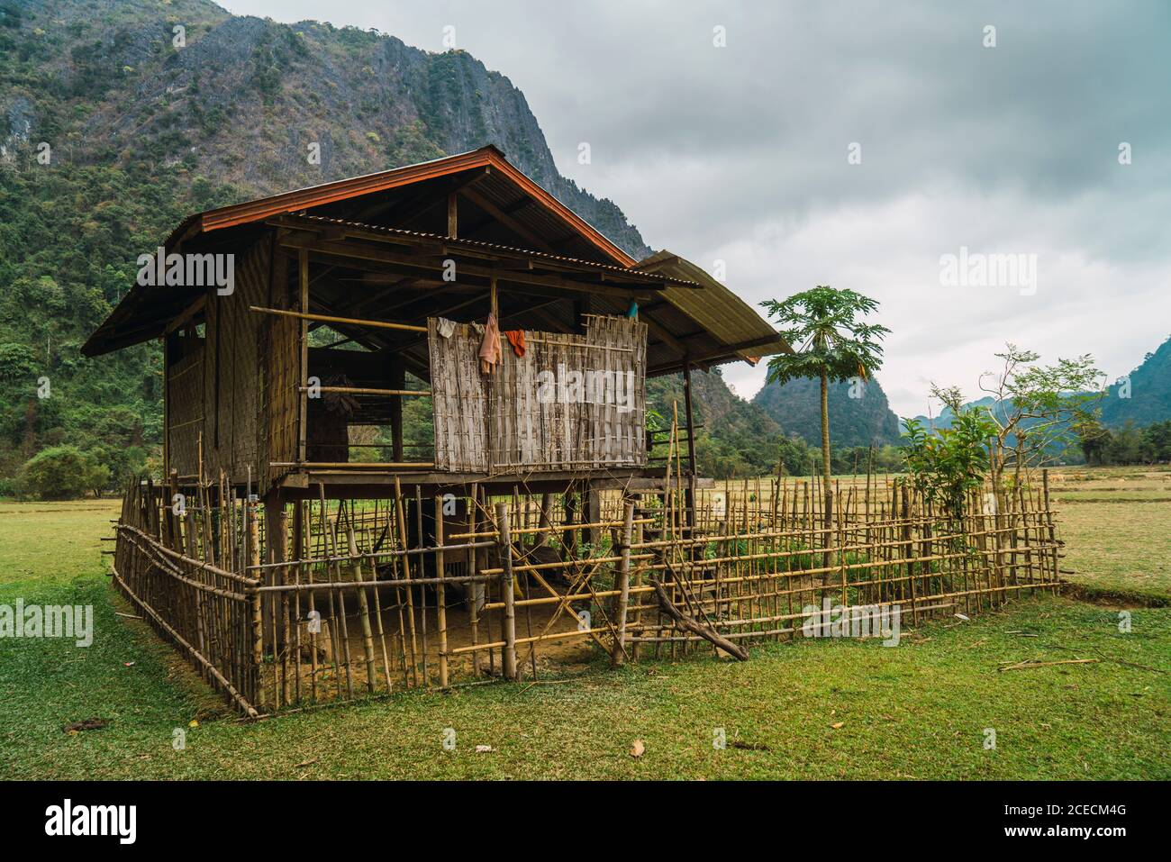 Small wooden hut on meadow Stock Photo - Alamy