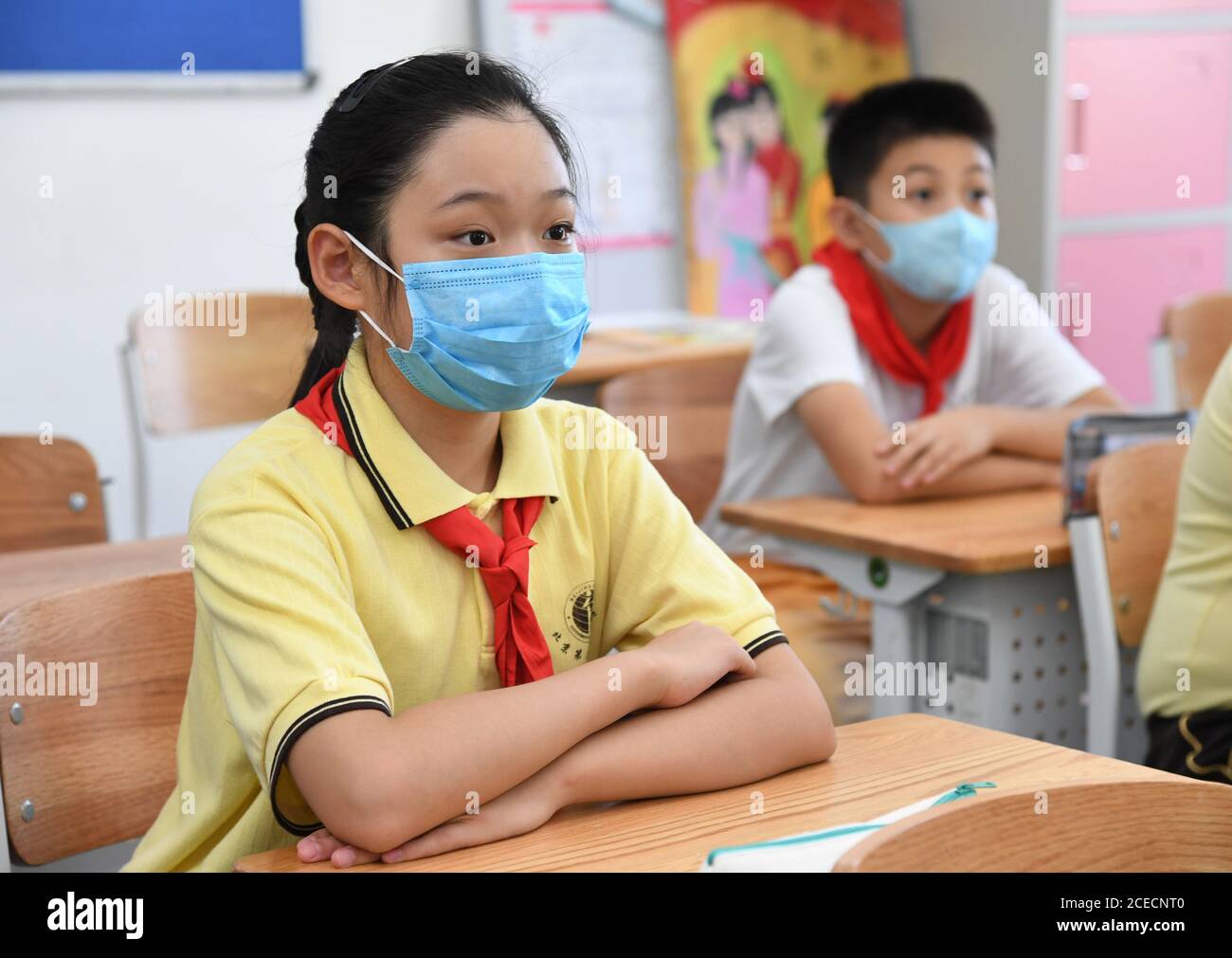 Beijing, China. 1st Sep, 2020. Students watch the opening ceremony of a ...
