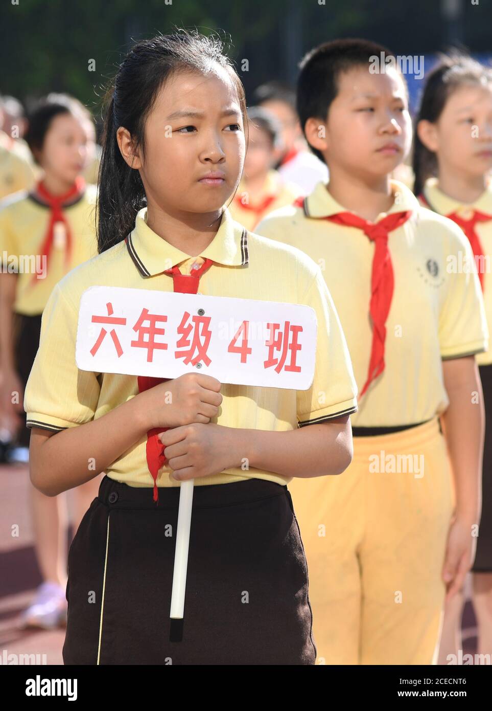 Beijing, China. 1st Sep, 2020. Students take part in a flag-raising ...