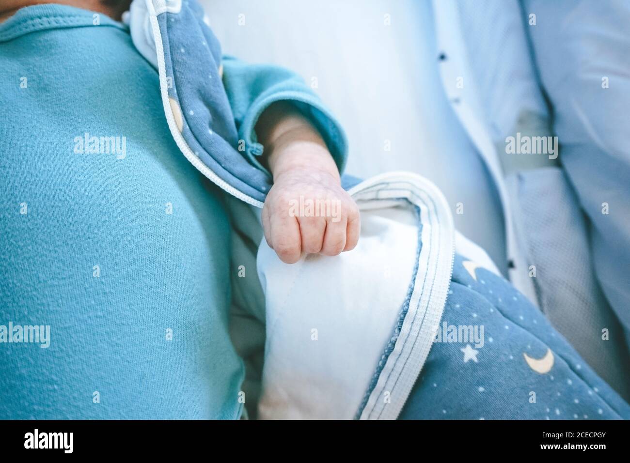 newborn little hand in a little cot Stock Photo - Alamy