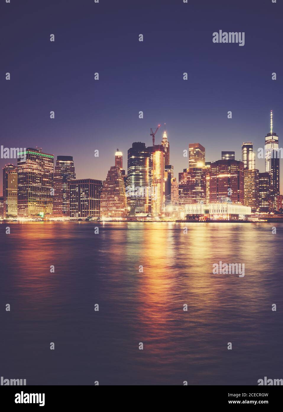 Manhattan waterfront at night, color toned picture, New York City, USA ...