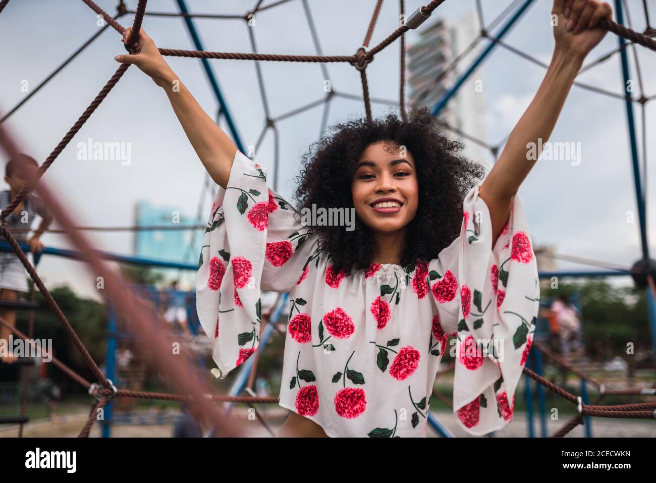 Woman on playground hi-res stock photography and images - Alamy