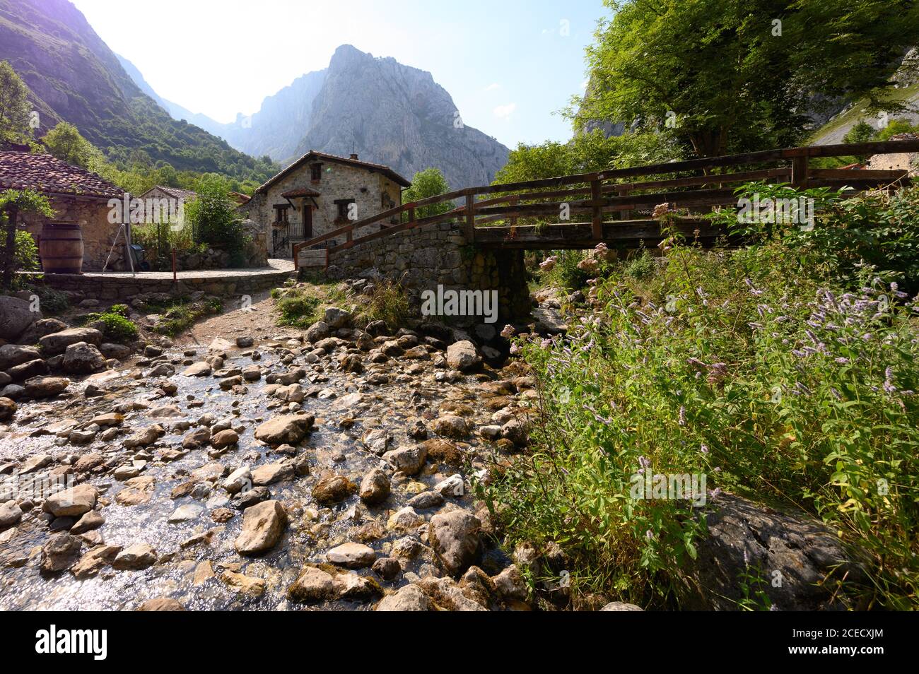 Bulnes, Spain. 07th Aug, 2020. The river Rio Bulnes flows in front of ...