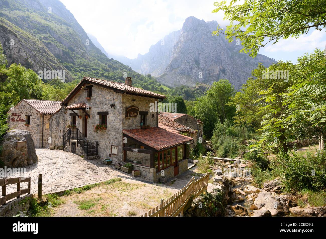 Bulnes, Spain. 07th Aug, 2020. The river Rio Bulnes flows in front of ...