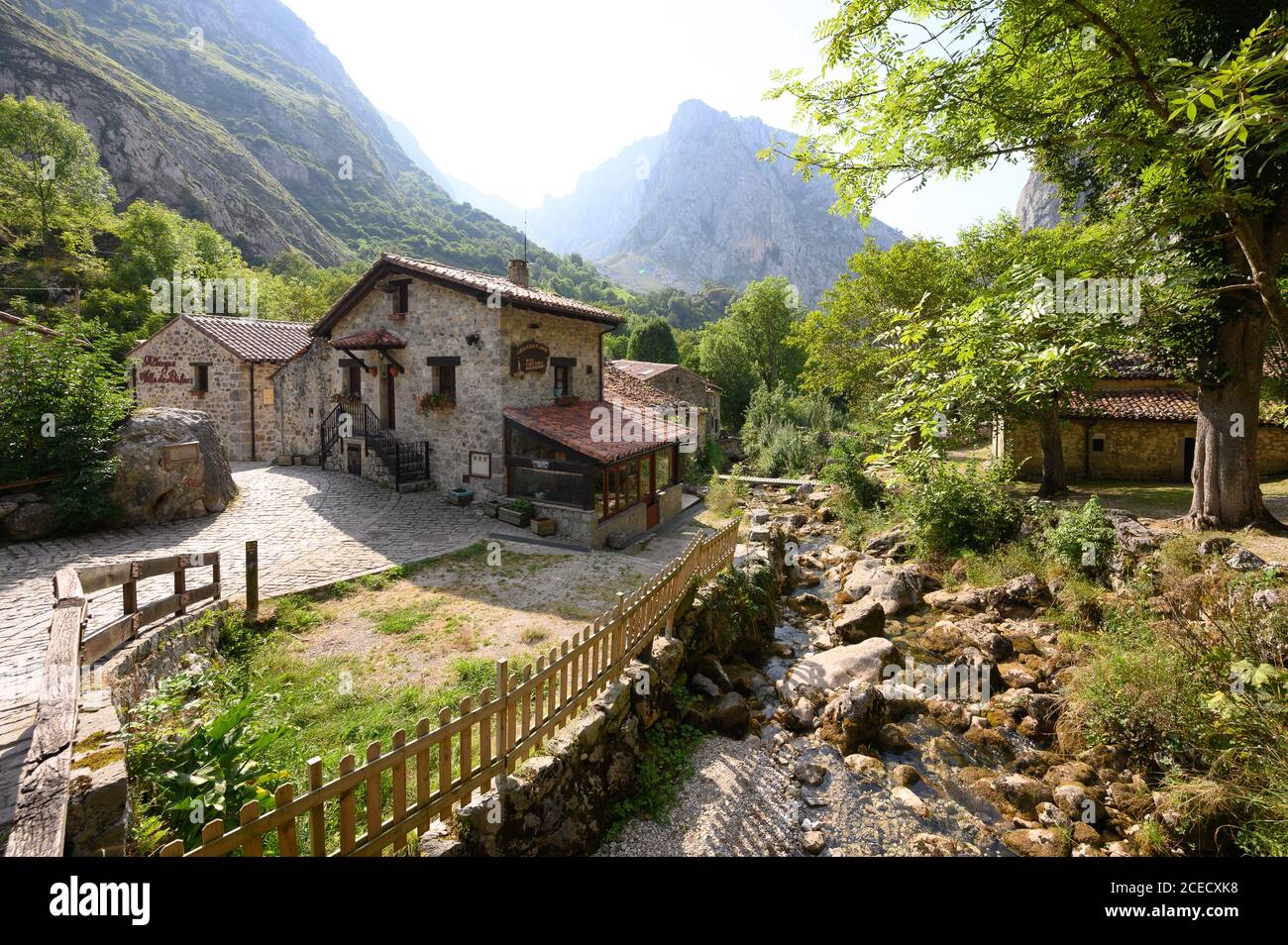 Bulnes, Spain. 07th Aug, 2020. The river Rio Bulnes flows in front of ...