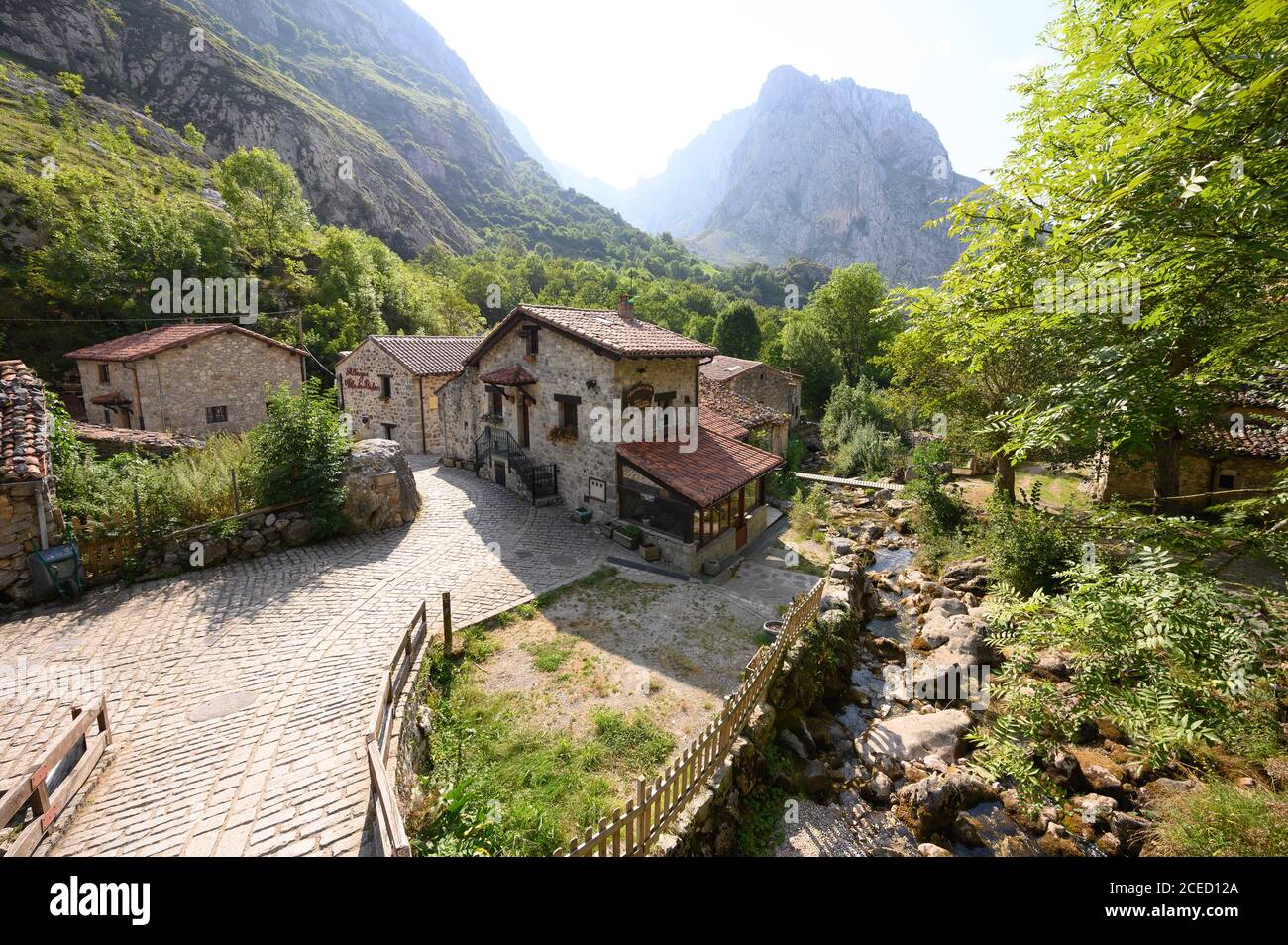Bulnes, Spain. 07th Aug, 2020. The river Rio Bulnes flows in front of ...