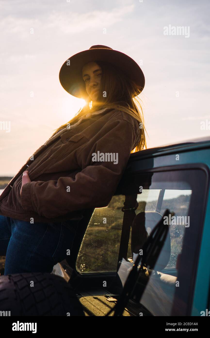 Leaning on back of car hi-res stock photography and images - Alamy