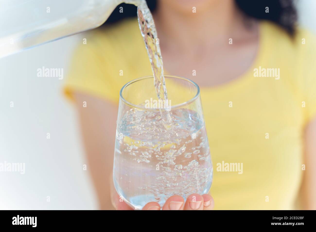 Pitcher water pouring clear glass hi-res stock photography and images ...