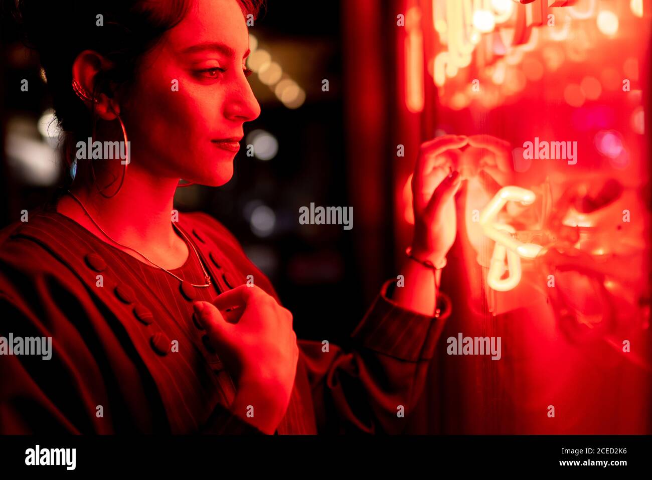 Female body neon red light hi-res stock photography and images - Alamy